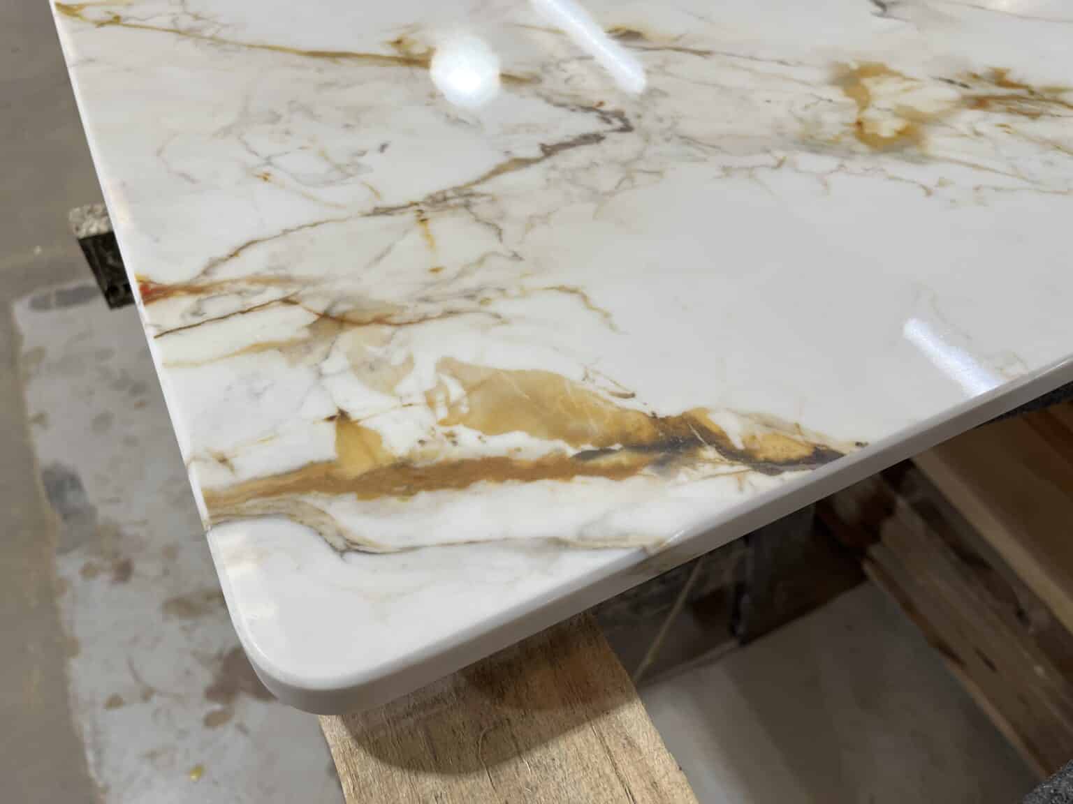 Calacatta Gold Quartz: Stunning White and Gold Surface | Cafe Tables